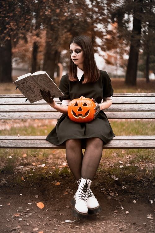 Emo Woman Reading Book With Jack O Lantern Pictures, Photos, and Images ...