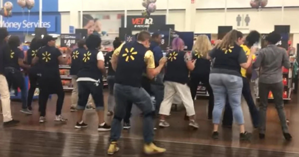 Walmart employees light up the store with creative popular line dance ...